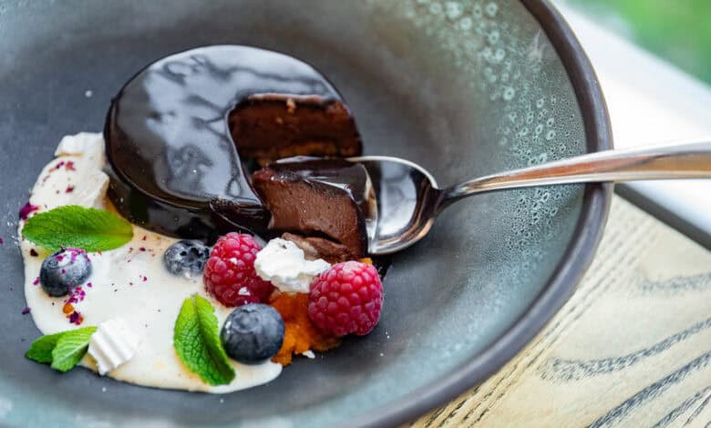 Chocolate fudge mousse cake with cream and forest berries | Network News