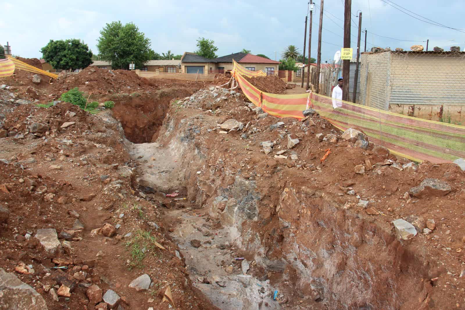 Residents raise alarm over dangerous open holes and trenches in Khutsong | Carletonville Herald