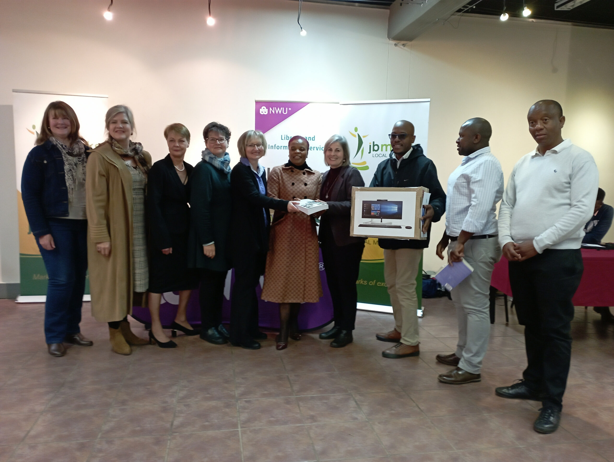 JB Marks Community Library receive books and computers from NWU ...