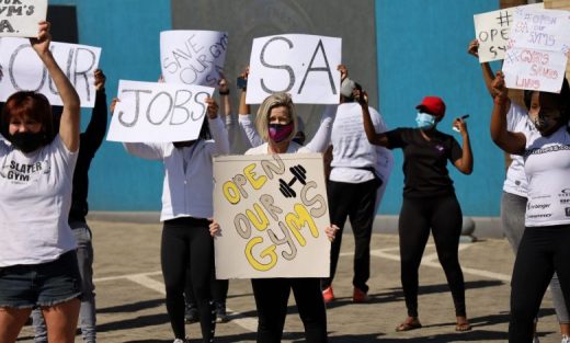 Slater Gym staff and owners hold a peaceful demonstration in Three ...