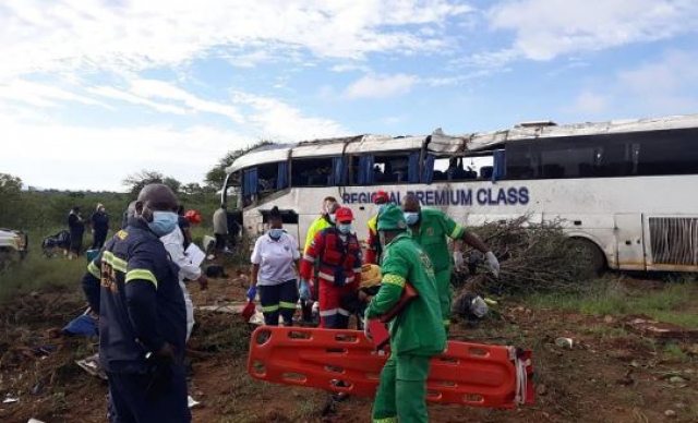 20 killed as bus rolls from bridge into a river following a head-on ...
