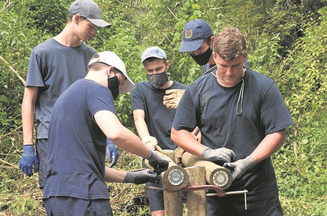 St Charles pupils build bridge at Bisley Nature Reserve | The Witness