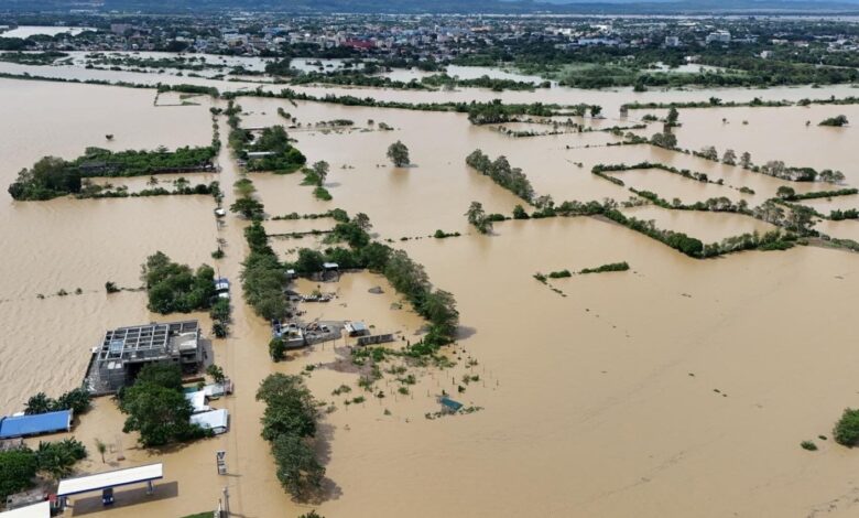 Philippine rescuers battle floodwaters to reach stranded | The Witness