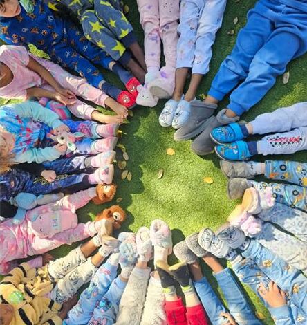 Little Steps learners walk in kindness, and pyjamas and slippers, for ...