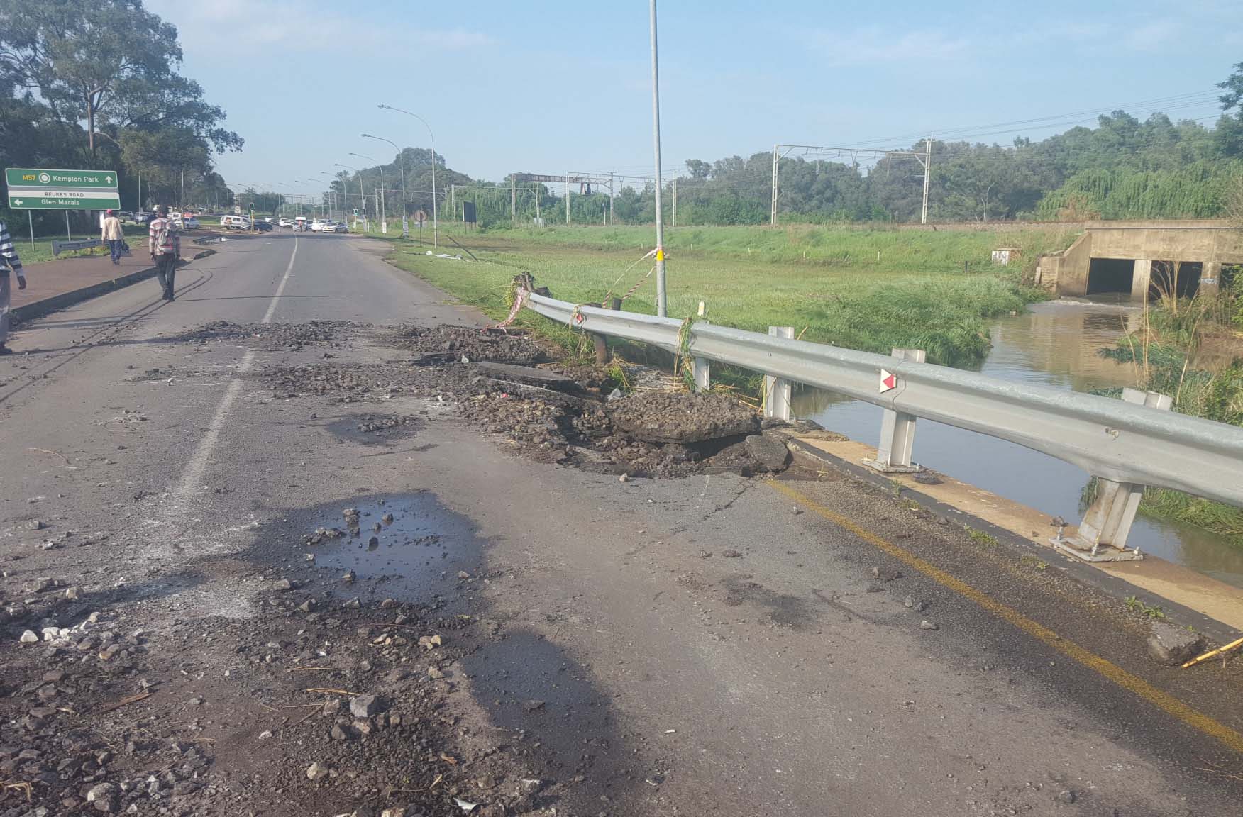 Car ends up in water after driving off Andrew Mapheto Drive bridge ...