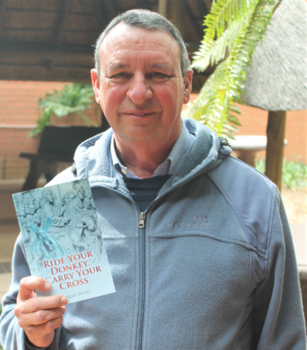 Reggie releases first book of Christian poetry | Comaro Chronicle