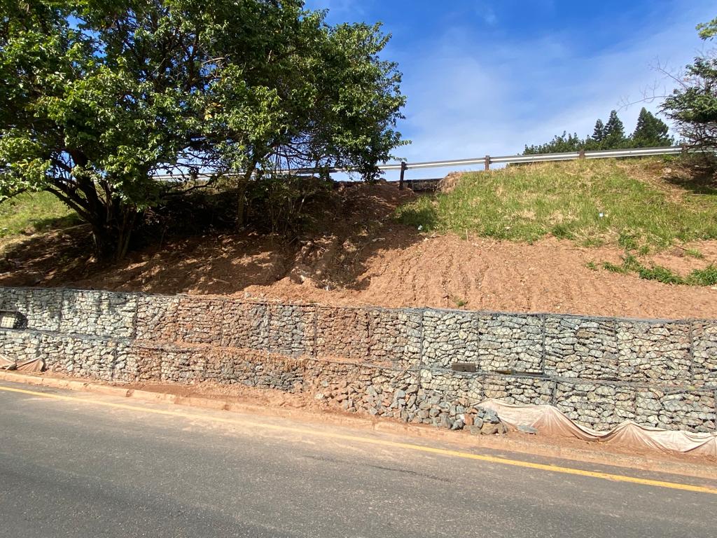 Sand passing through gabion cages on M13 off-ramp | Highway Mail