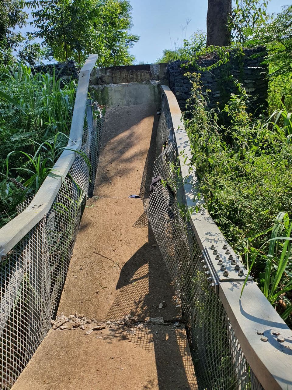 Two injured as pedestrian bridge collapses | South Coast Herald