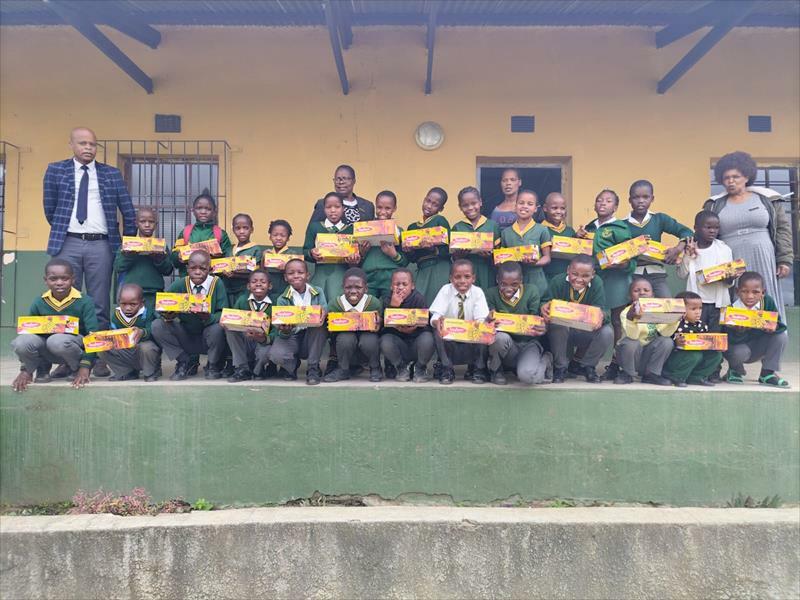 Legislature donates school shoes to Magaye Primary | South Coast Herald