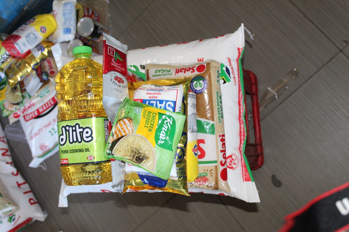 100 families receive food parcels from a local supermarket to help them ...