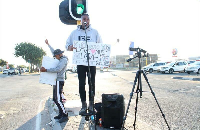 WATCH: Young talented busker entertains people at the robots | Midrand ...