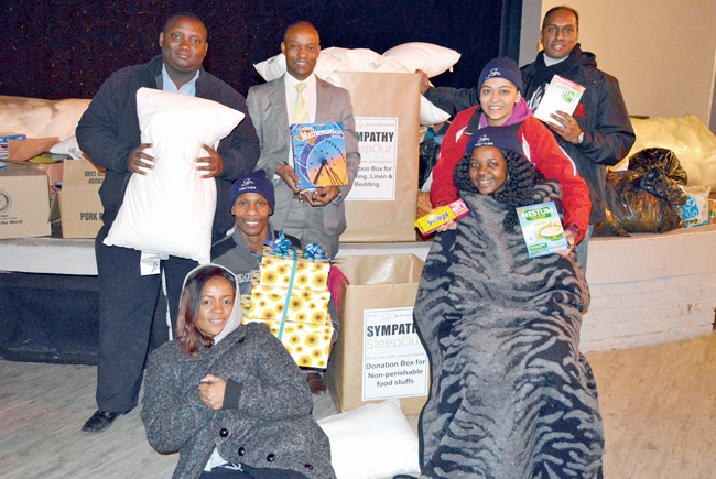 Meropa employees brave cold for kids | Review