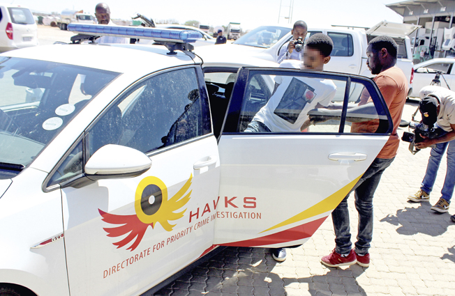 Hawks arrest testing officials | Review