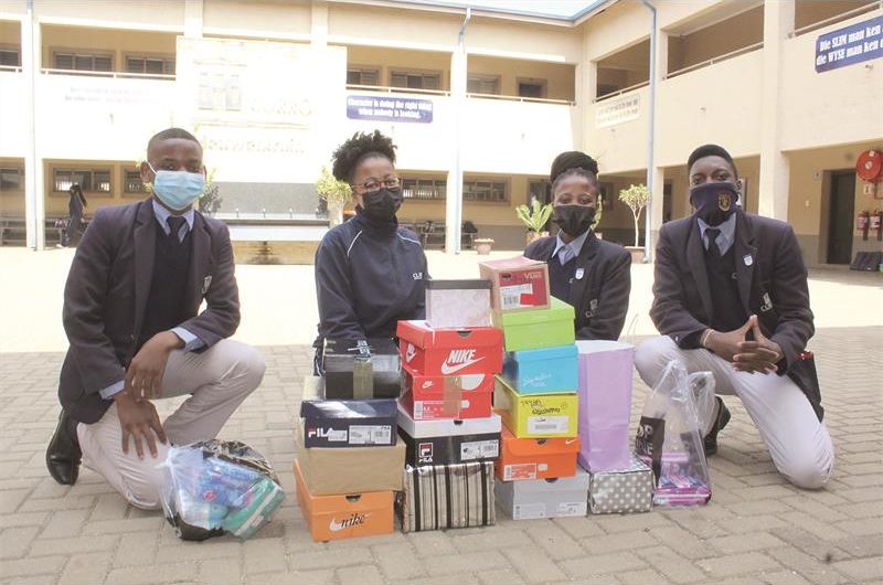 Finalists collect, give 200 boxes | Review