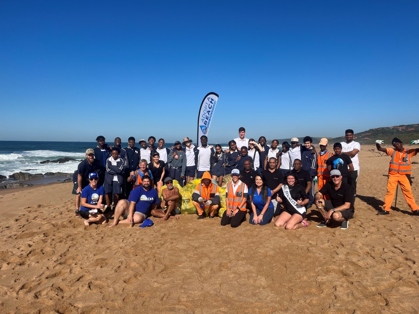 Beach litter busters get to work | North Coast Courier
