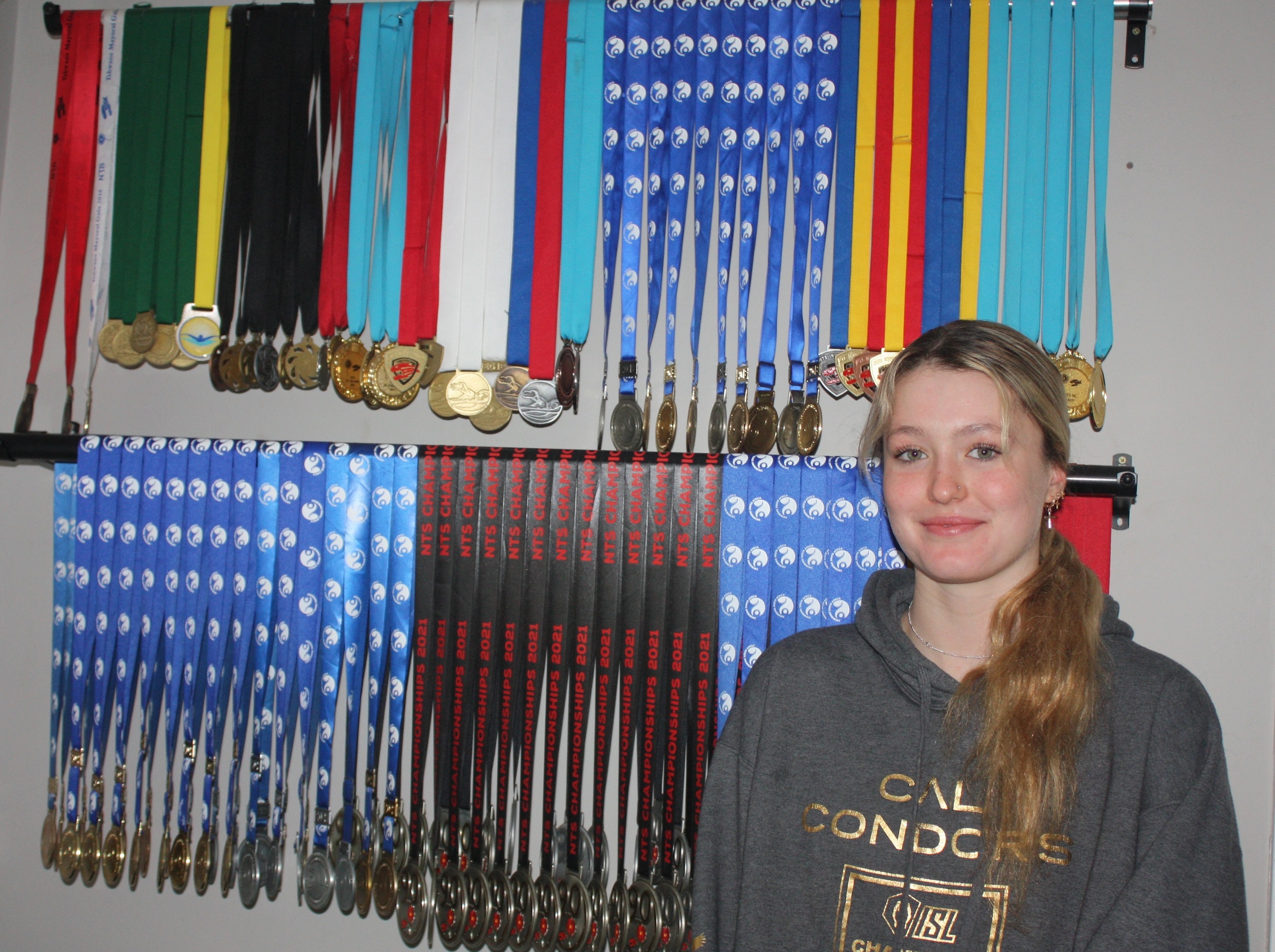 Local young swimmer hopes to do her country proud at junior world ...