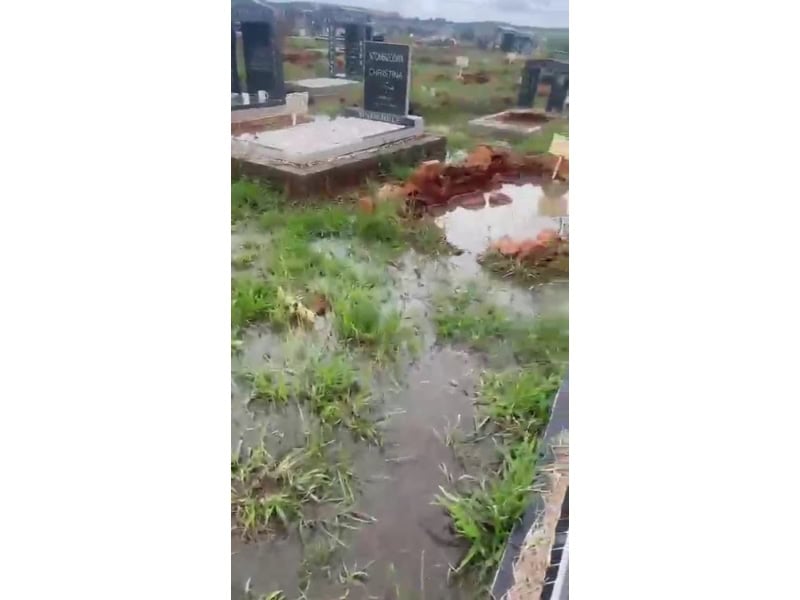 WATCH: Relatives flock to Phomolong cemetery following rain, flood ...
