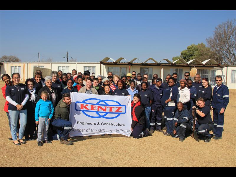 Kentz employees plant trees for Mandela Day | Ridge Times