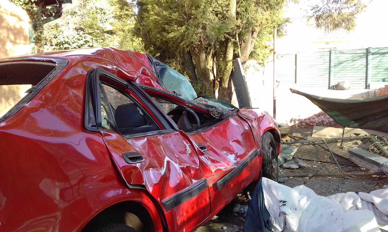 Motorist crashes through fence into disabled person's car in Evander ...