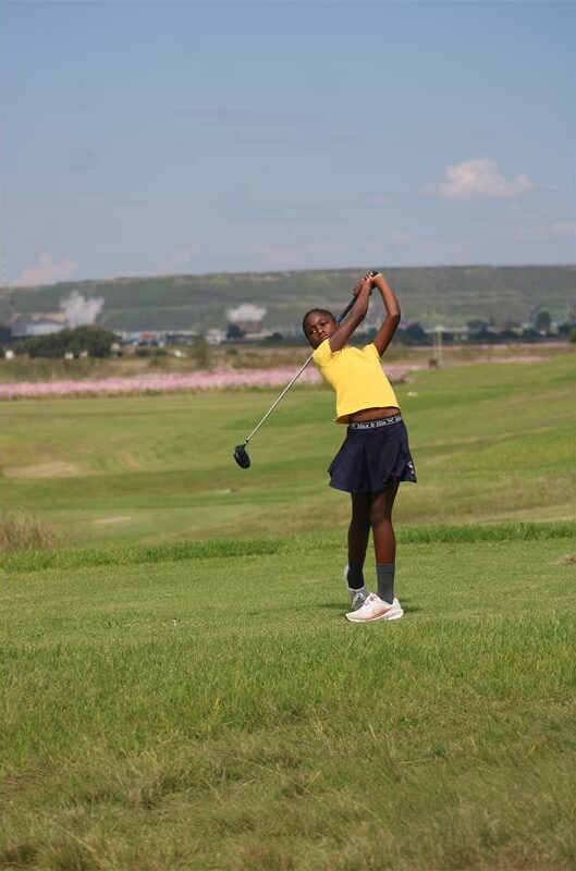 Junior golf players practice skills at golf day in Secunda | Ridge Times